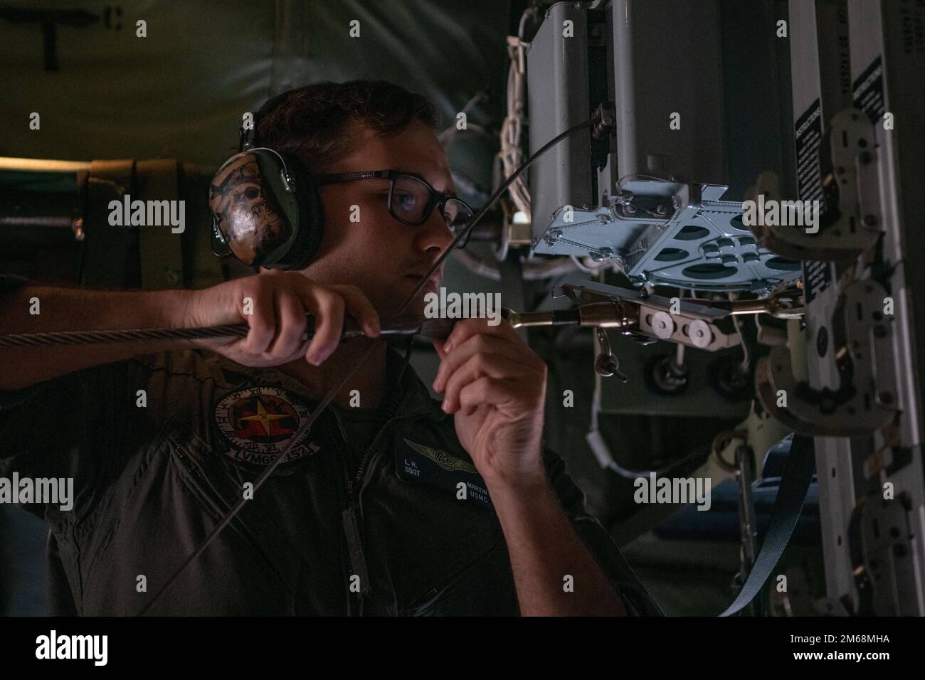 U.S. Marine Corps Staff Sgt. Louis Martin, a KC-130J Super Hercules ...
