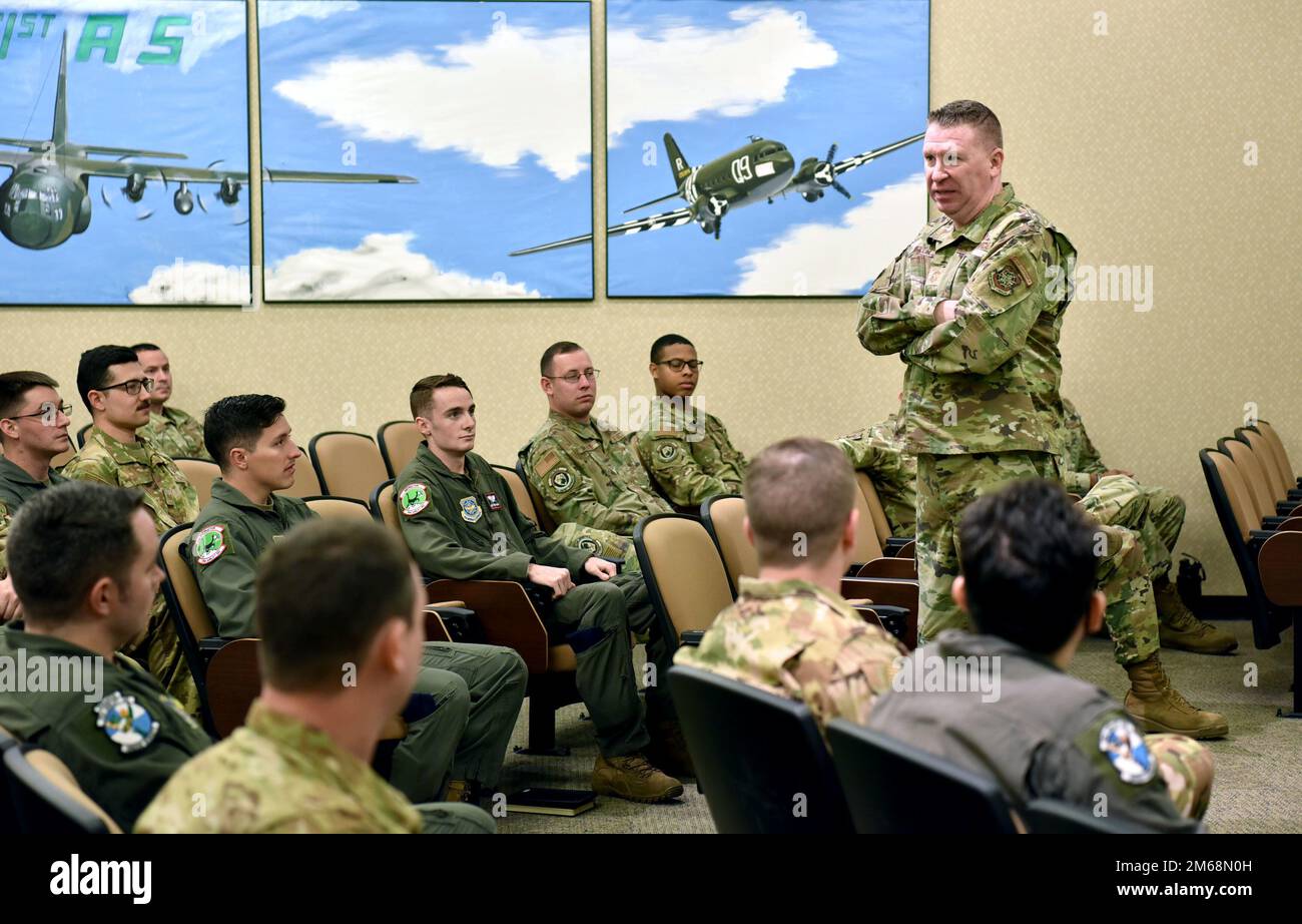 Chief Master Sgt. Chad Bickley, 18th Air Force command chief, gives a ...