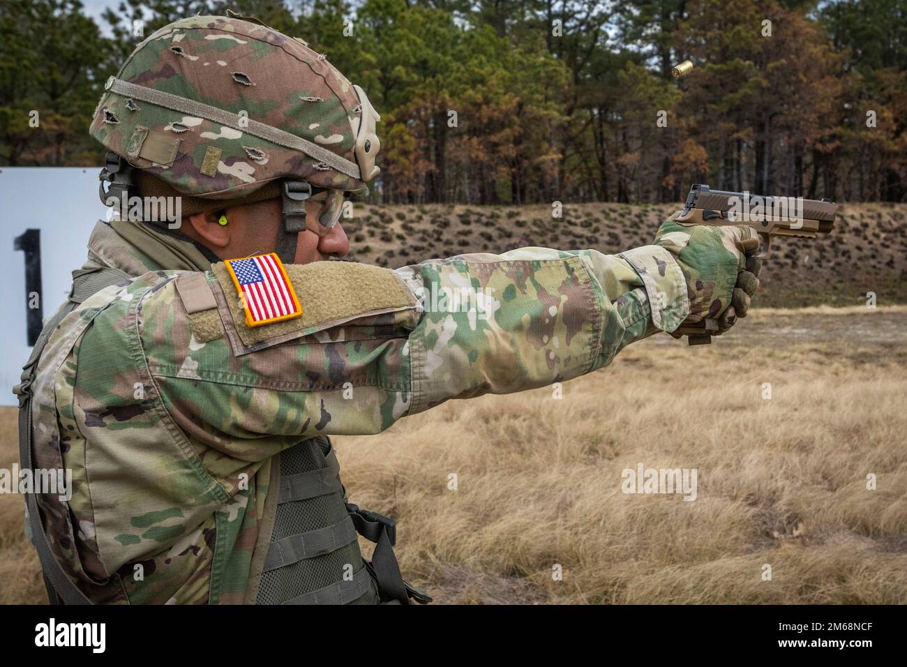 U.S. Army Sgt. Christian Martinez, 253rd Transportation Company, fires ...