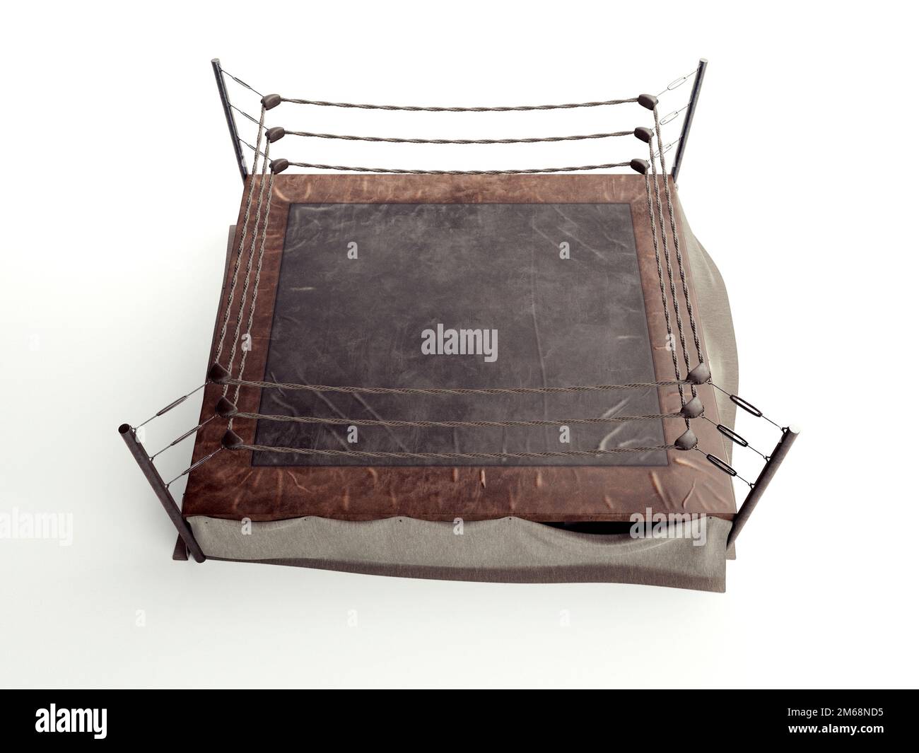 An old vintage boxing ring surrounded by ropes on an isolated white ...