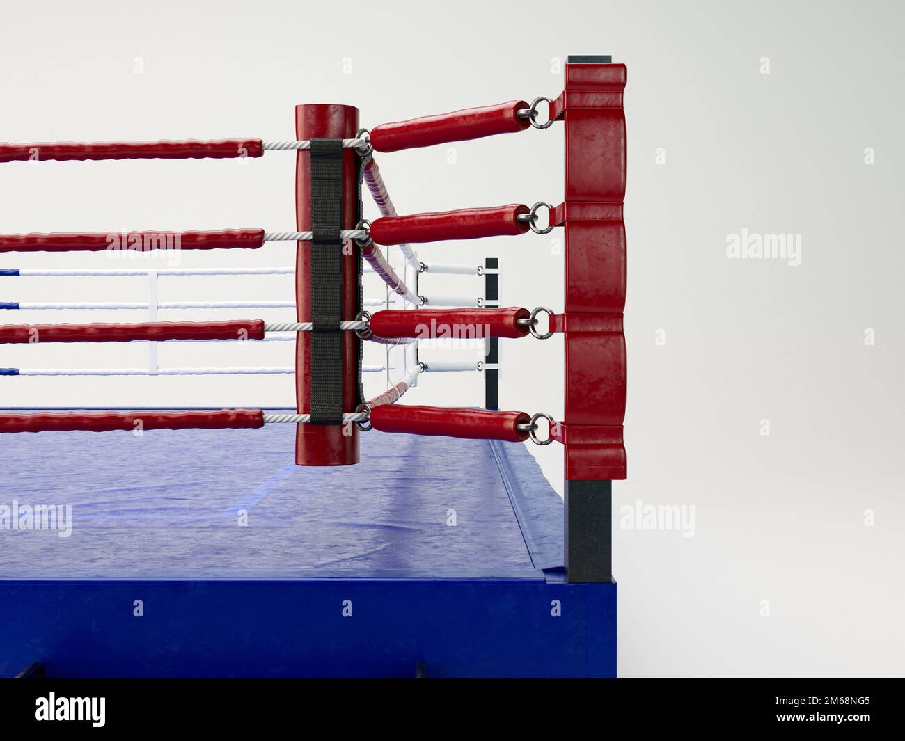 A modern oversized boxing ring with opposing blue and red corners on an ...