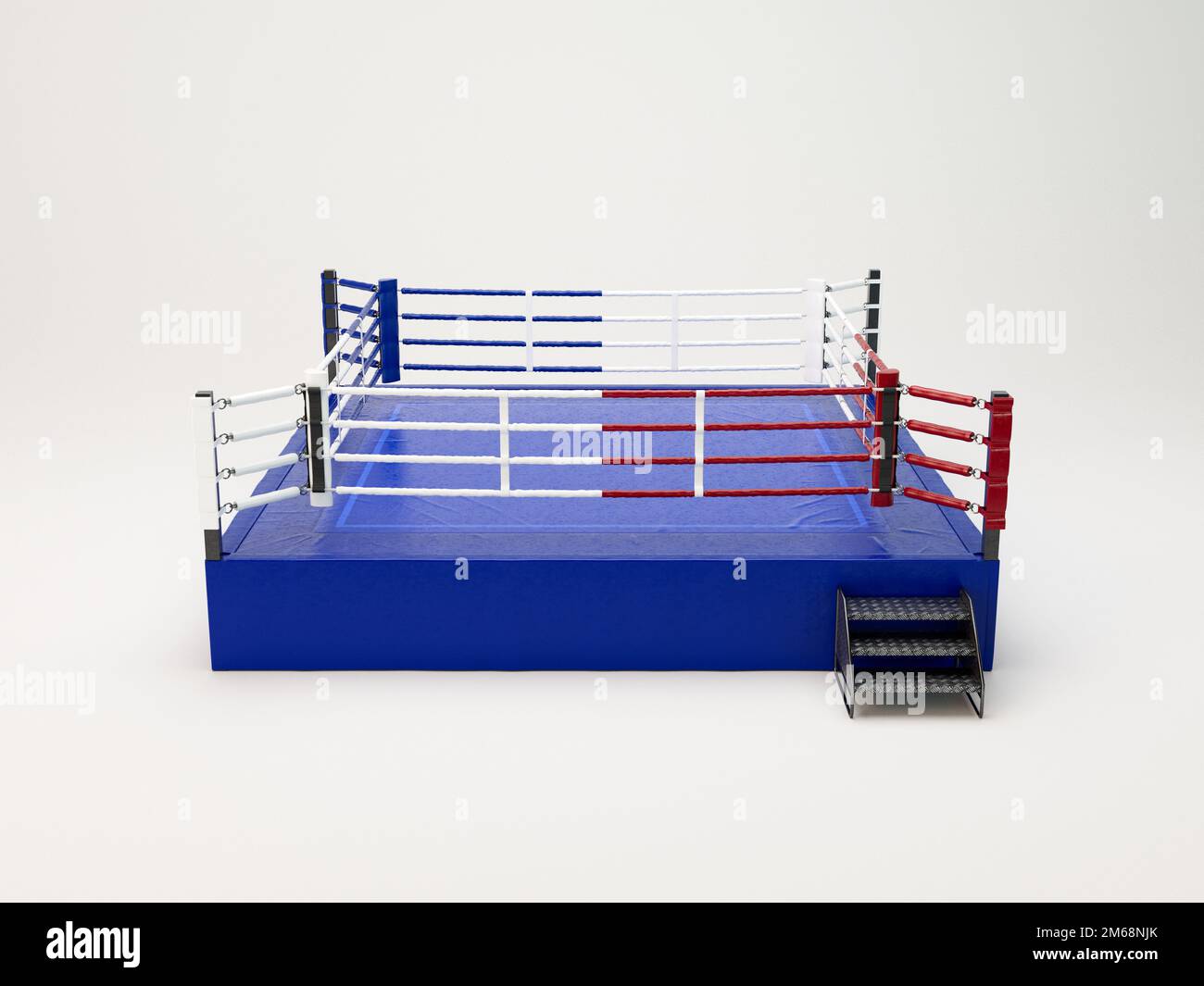A modern regulation sized boxing ring with opposing blue and red ...