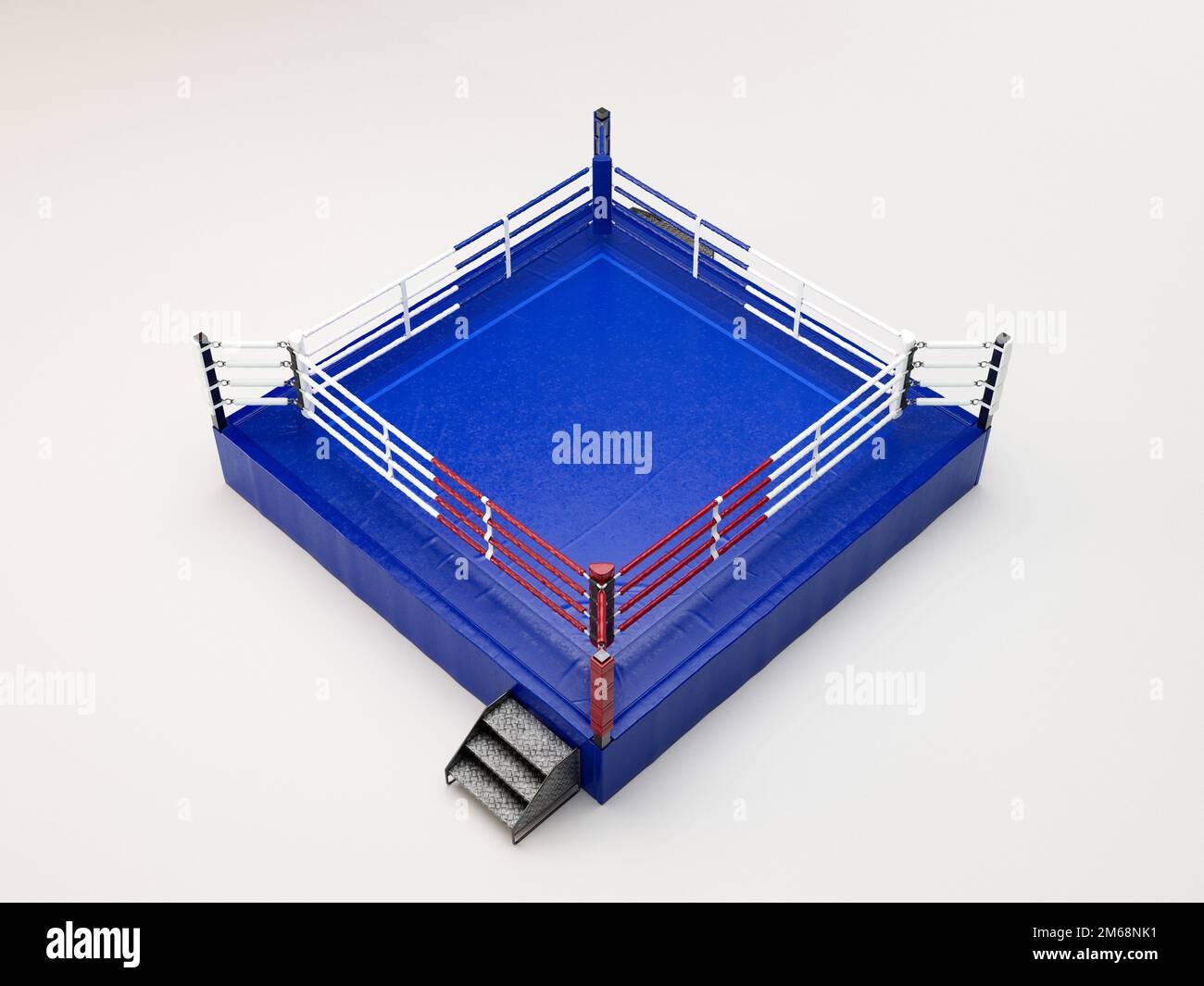 A modern regulation sized boxing ring with opposing blue and red ...