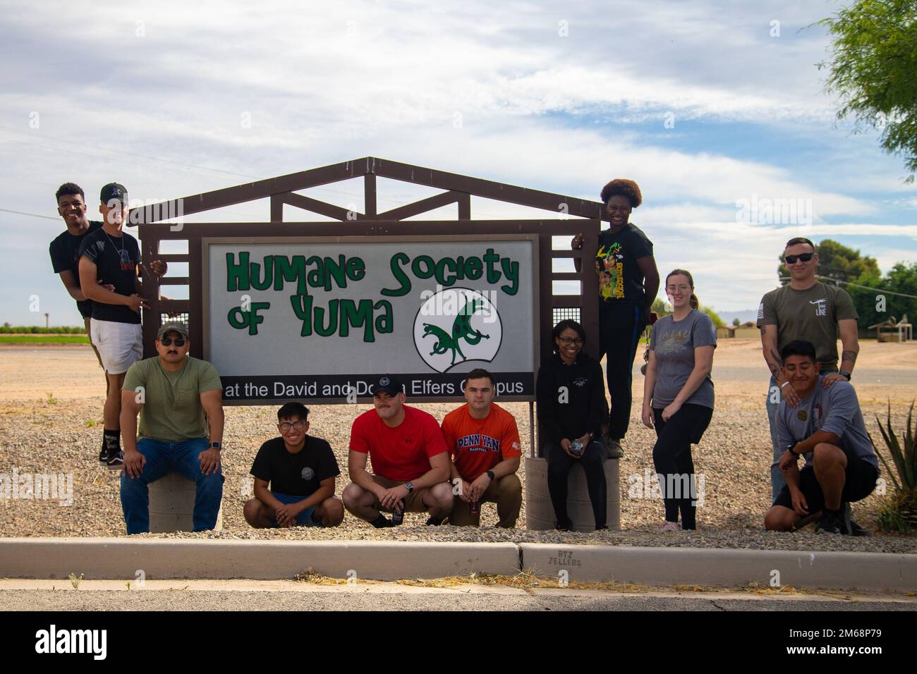 U.S. Marine Corps volunteers with the Single Marine Program (SMP) pose ...