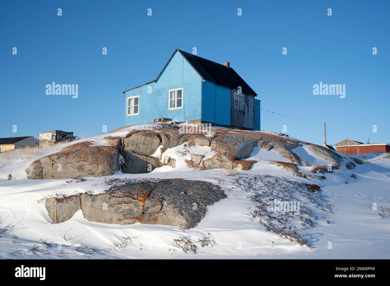 Colourful wooden houses in the tiny Inuit settlement of Oqaatsut ...