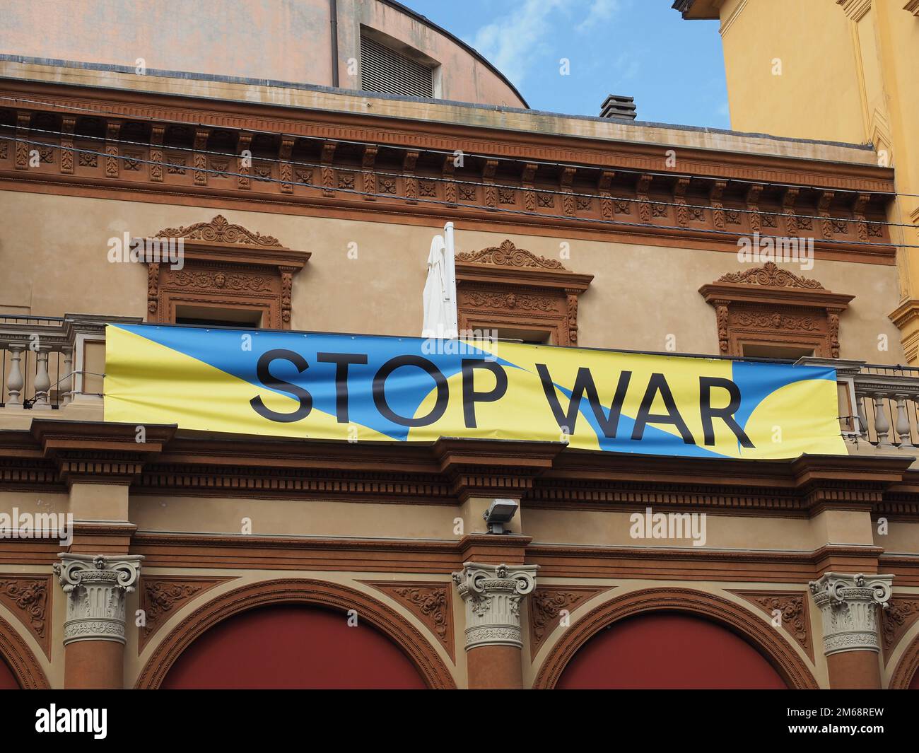 stop war sign with Ukrainian flag colours Stock Photo - Alamy