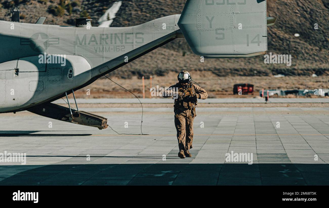 A U.S. Marine aircraft crew chief with Marine Medium Tiltrotor Squadron ...