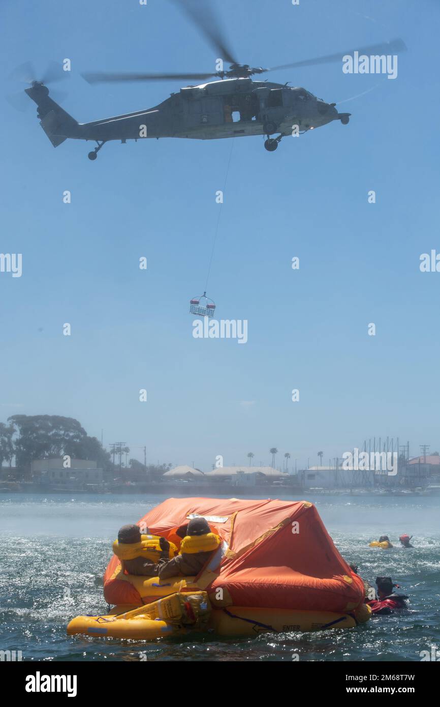 220419-N-EV253-1689 SAN DIEGO (April 19, 2022) – An MH-60S Seahawk ...