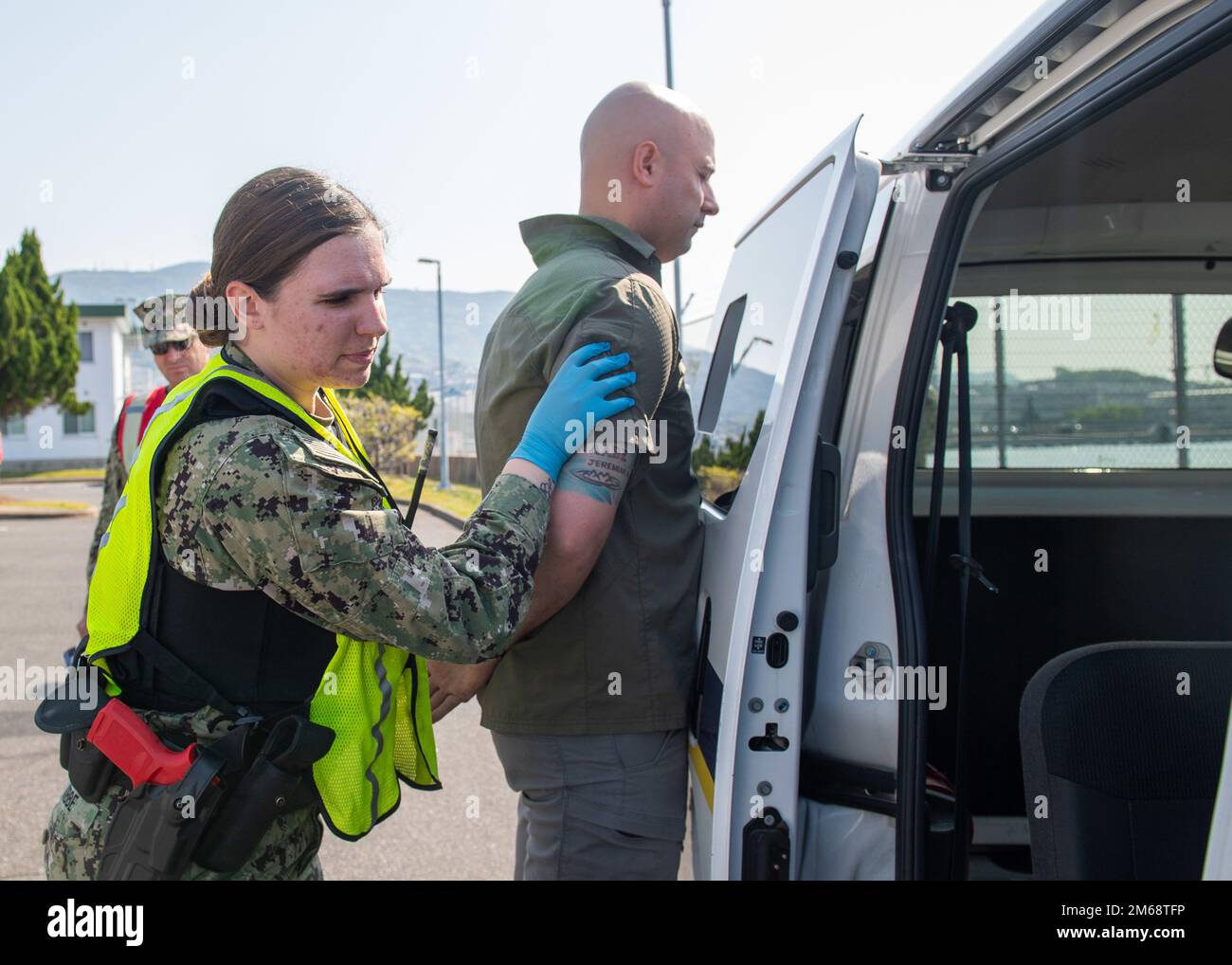 Master-at-Arms Seaman Apprentice Ashley Kibbe, assigned to Commander ...
