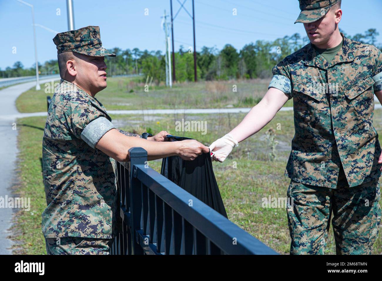 U.S. Marine Corps Master Sgt. Edgar R. Grefiel (left) and Pfc. Seth ...