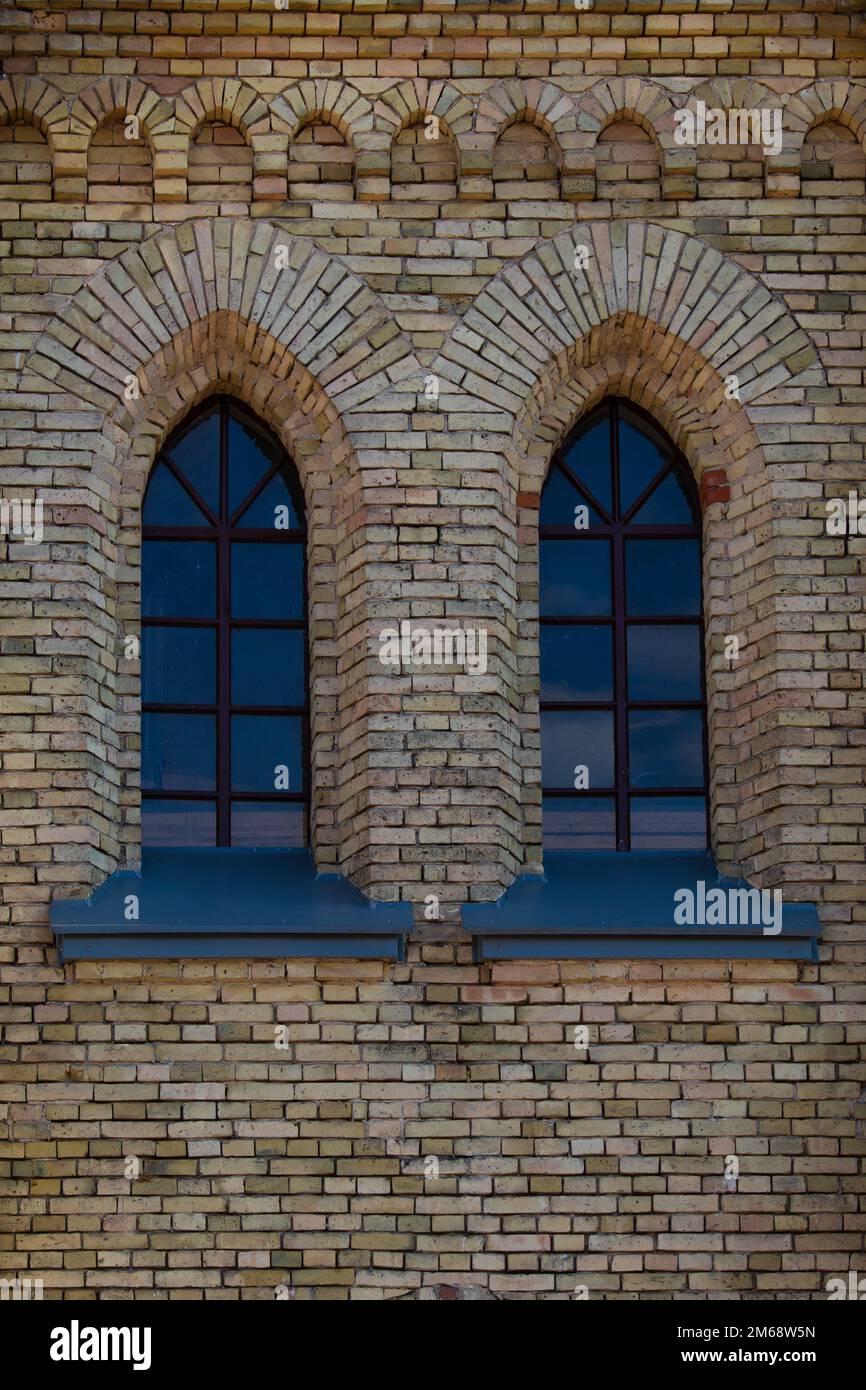 Texture background, window on the wall of a wooden and stone house ...