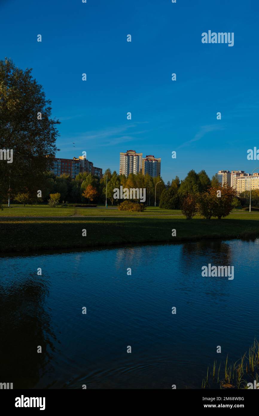 Buildings and houses standing on the shore of a lake, river or sea ...