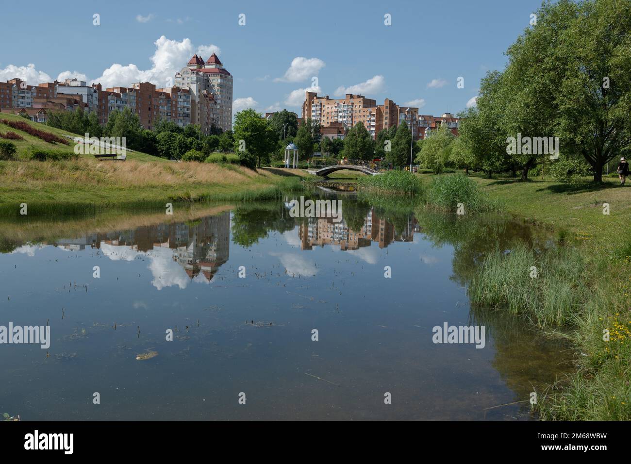 Buildings and houses standing on the shore of a lake, river or sea ...