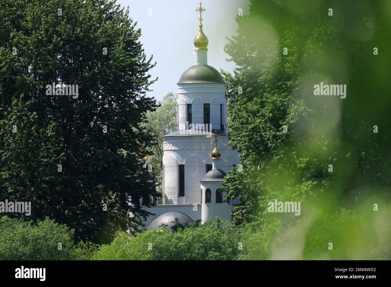 Small Orthodox church with golden domes Stock Photo - Alamy