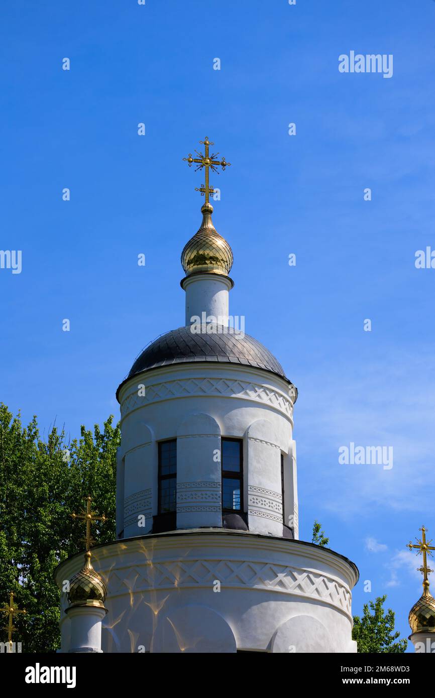 Small Orthodox church with golden domes Stock Photo - Alamy
