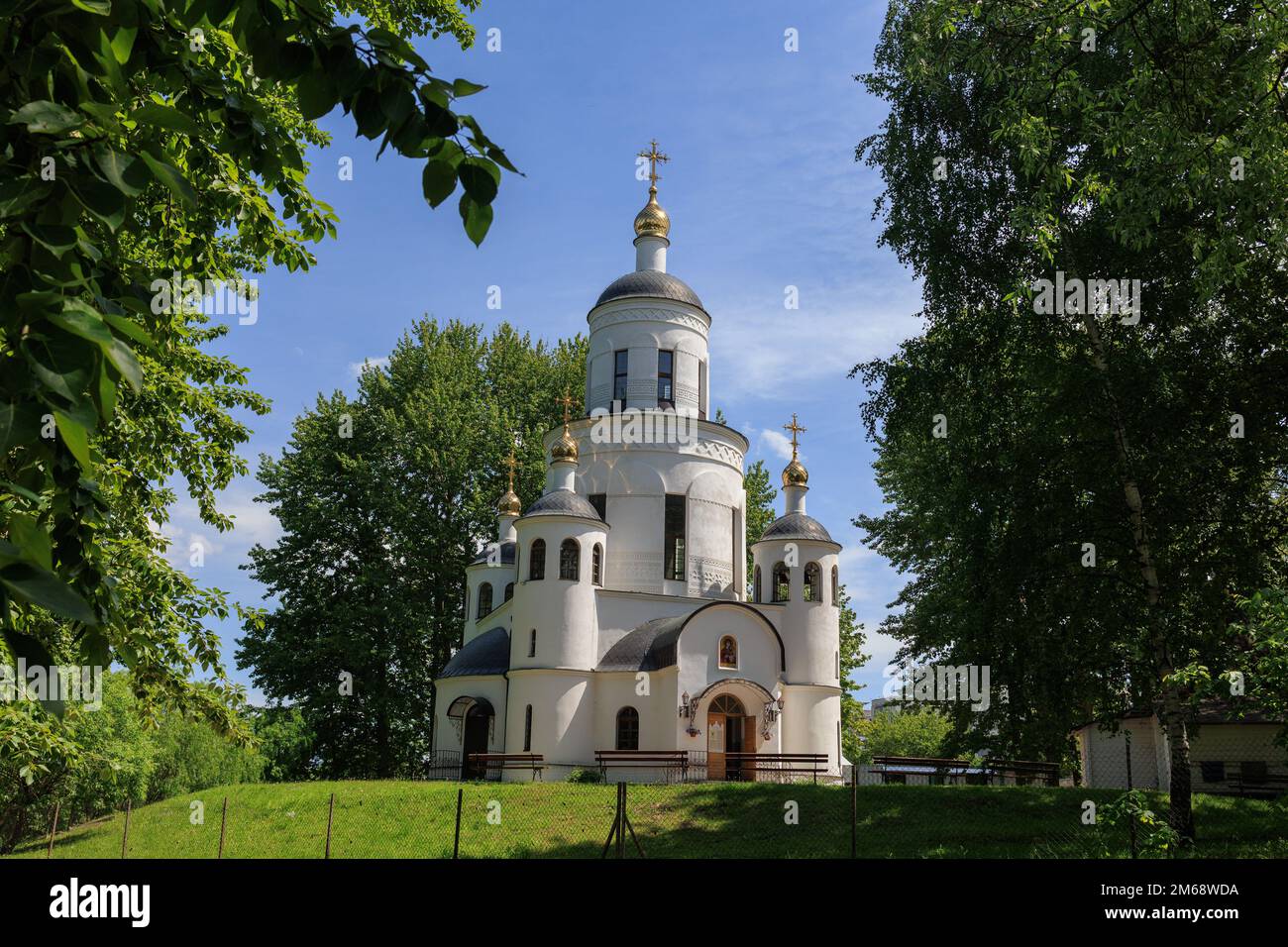 Small Orthodox church with golden domes Stock Photo - Alamy