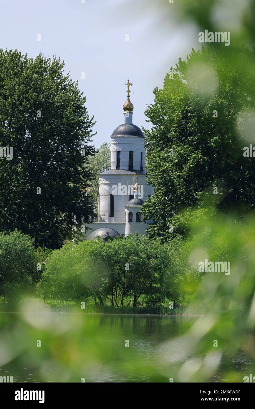 Small Orthodox church with golden domes Stock Photo - Alamy