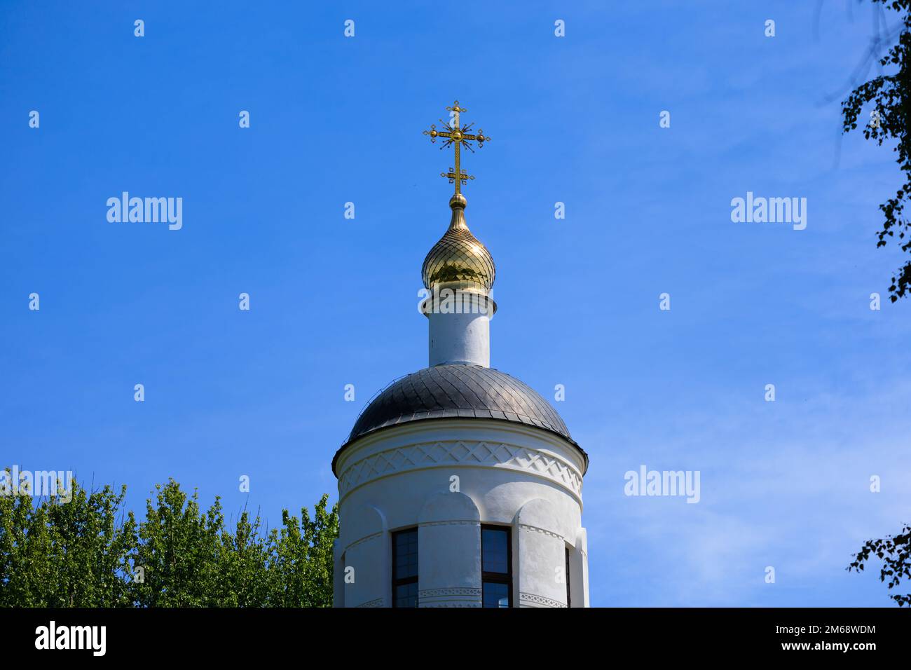 Small Orthodox church with golden domes Stock Photo - Alamy