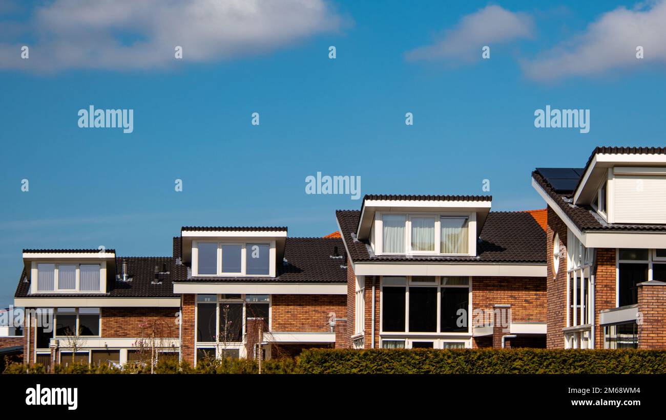 Dutch Suburban area with modern family houses, newly build modern ...