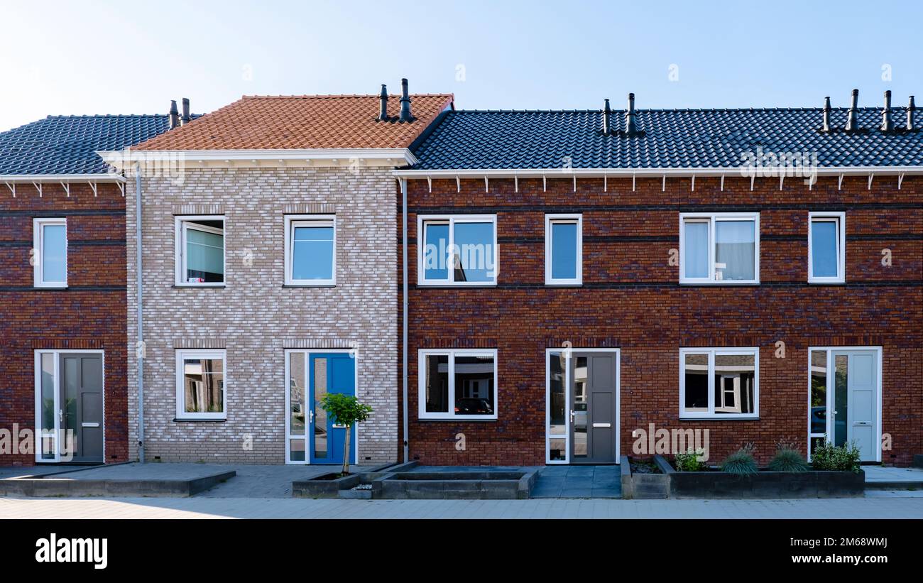 Dutch Suburban area with modern family houses, newly build modern ...