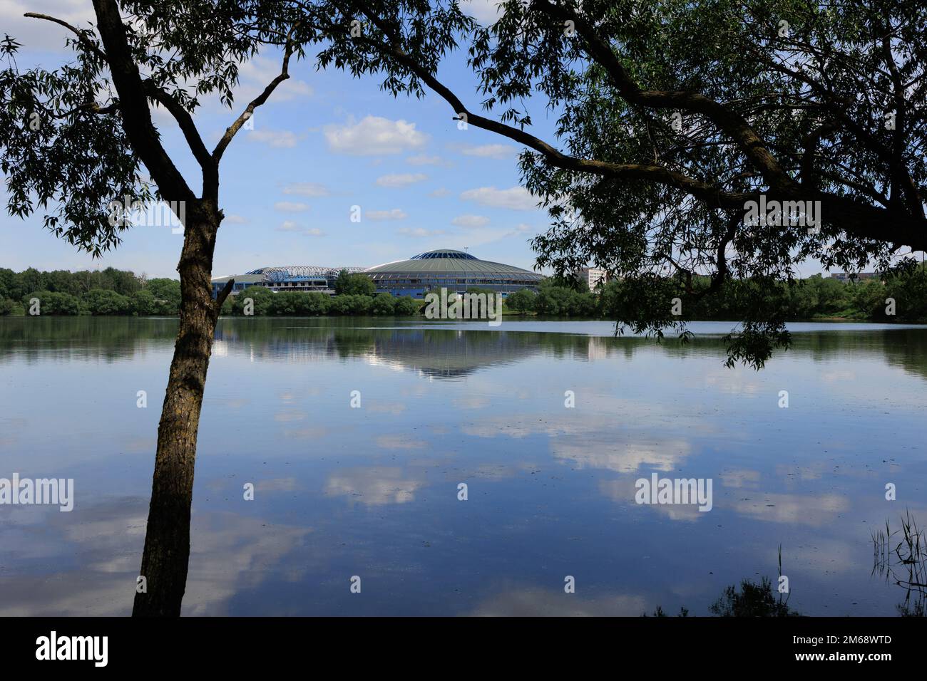 Buildings and houses standing on the shore of a lake, river or sea ...