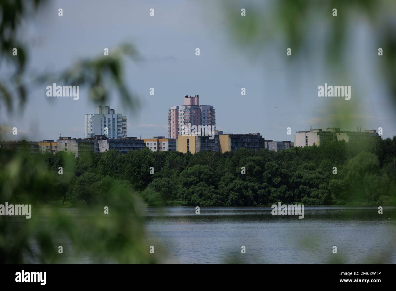 Buildings and houses standing on the shore of a lake, river or sea ...