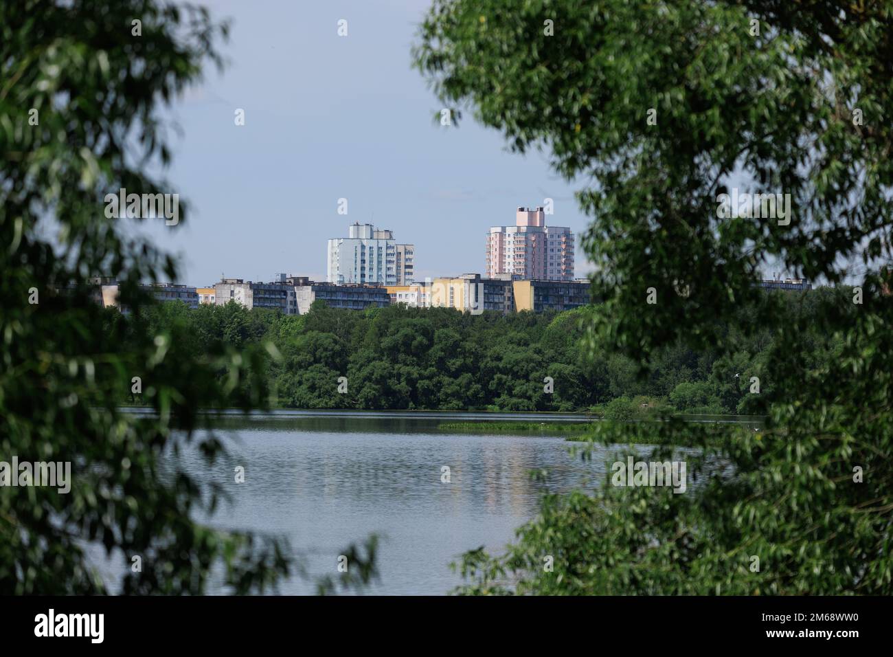 Buildings and houses standing on the shore of a lake, river or sea ...