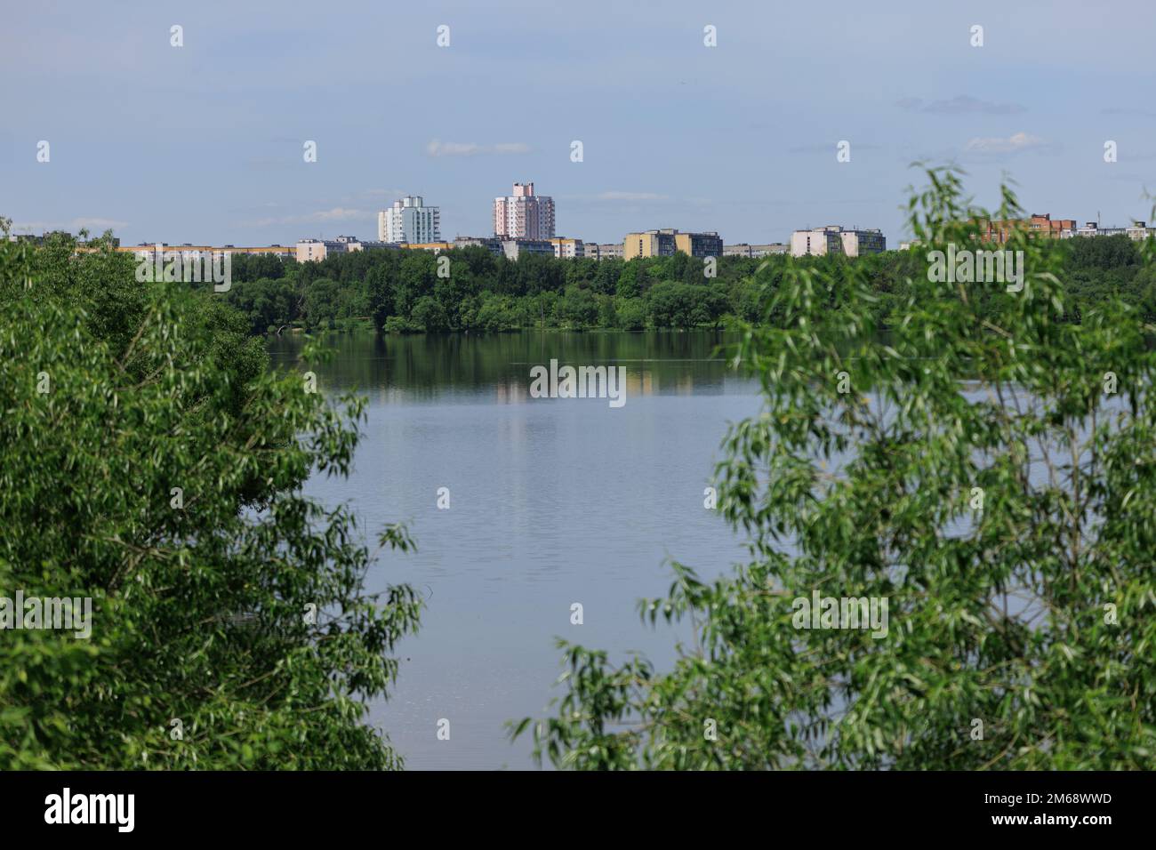 Buildings and houses standing on the shore of a lake, river or sea ...