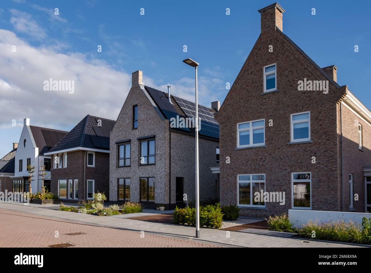 Dutch Suburban area with modern family houses, newly build modern ...