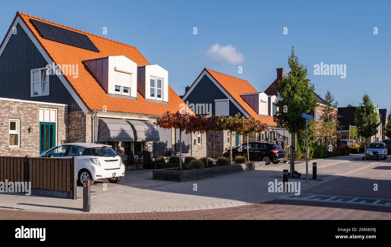 Dutch Suburban area with modern family houses, newly build modern ...