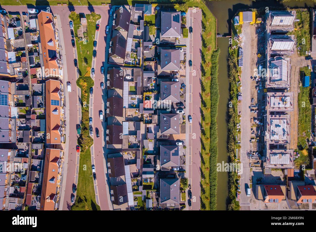 Dutch Suburban area with modern family houses, newly build modern ...