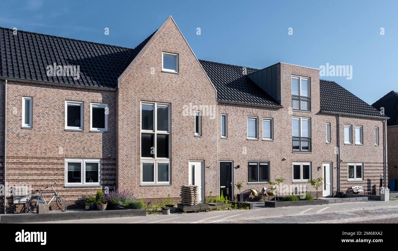 Dutch Suburban area with modern family houses, newly build modern ...