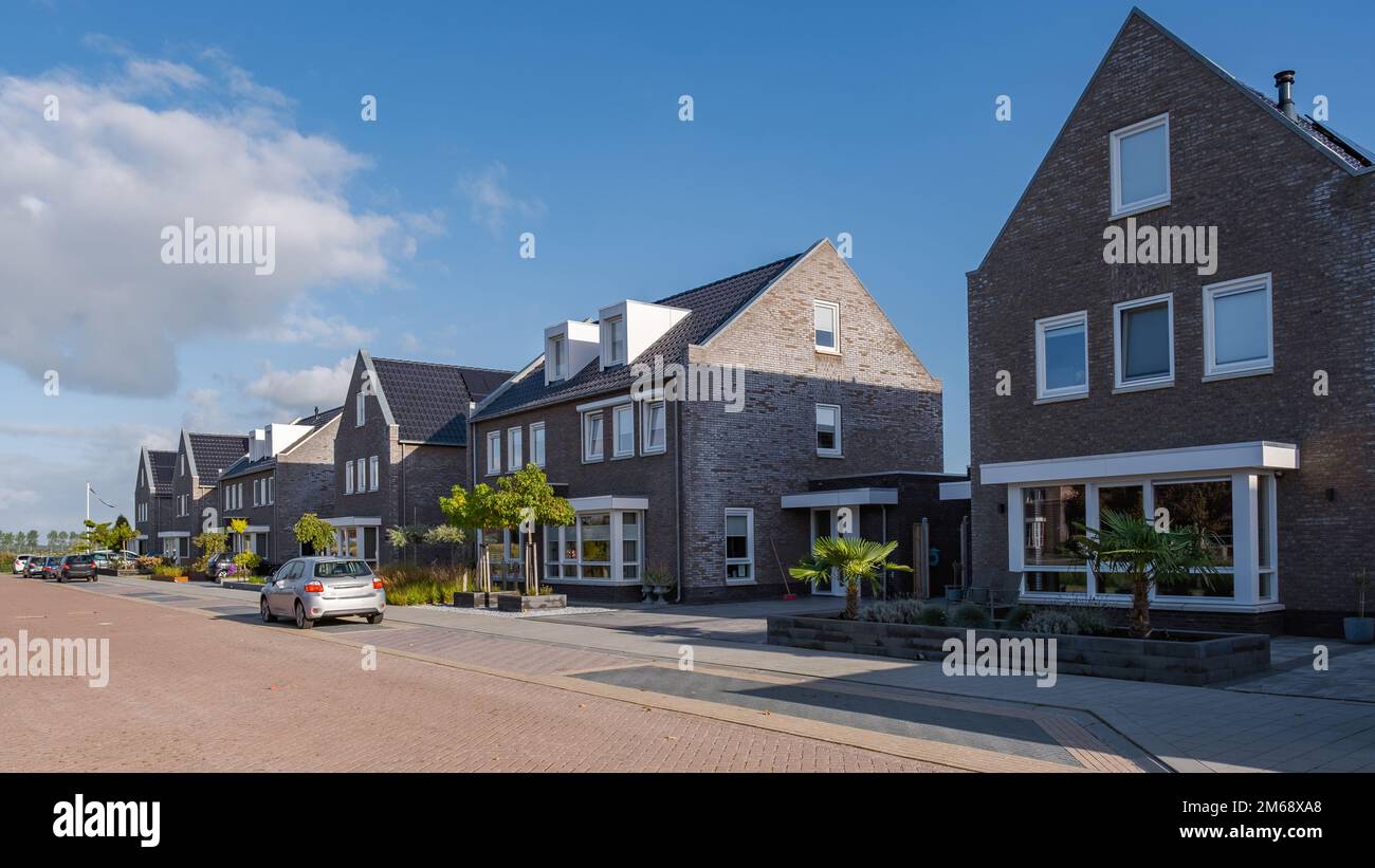 Dutch Suburban area with modern family houses, newly build modern ...
