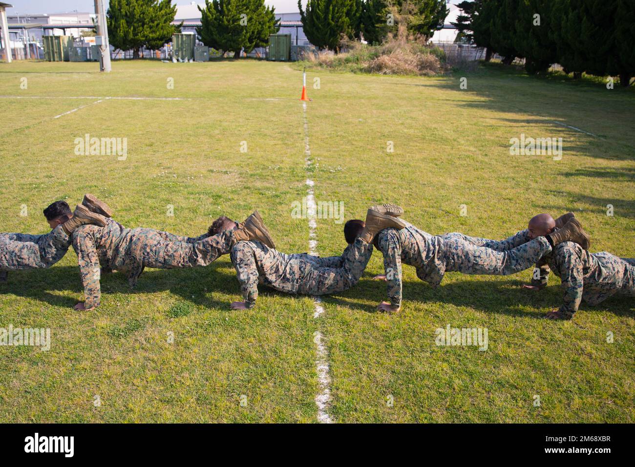 U.S. Marines with Marine Aircraft Group (MAG) 12 warm up during a ...