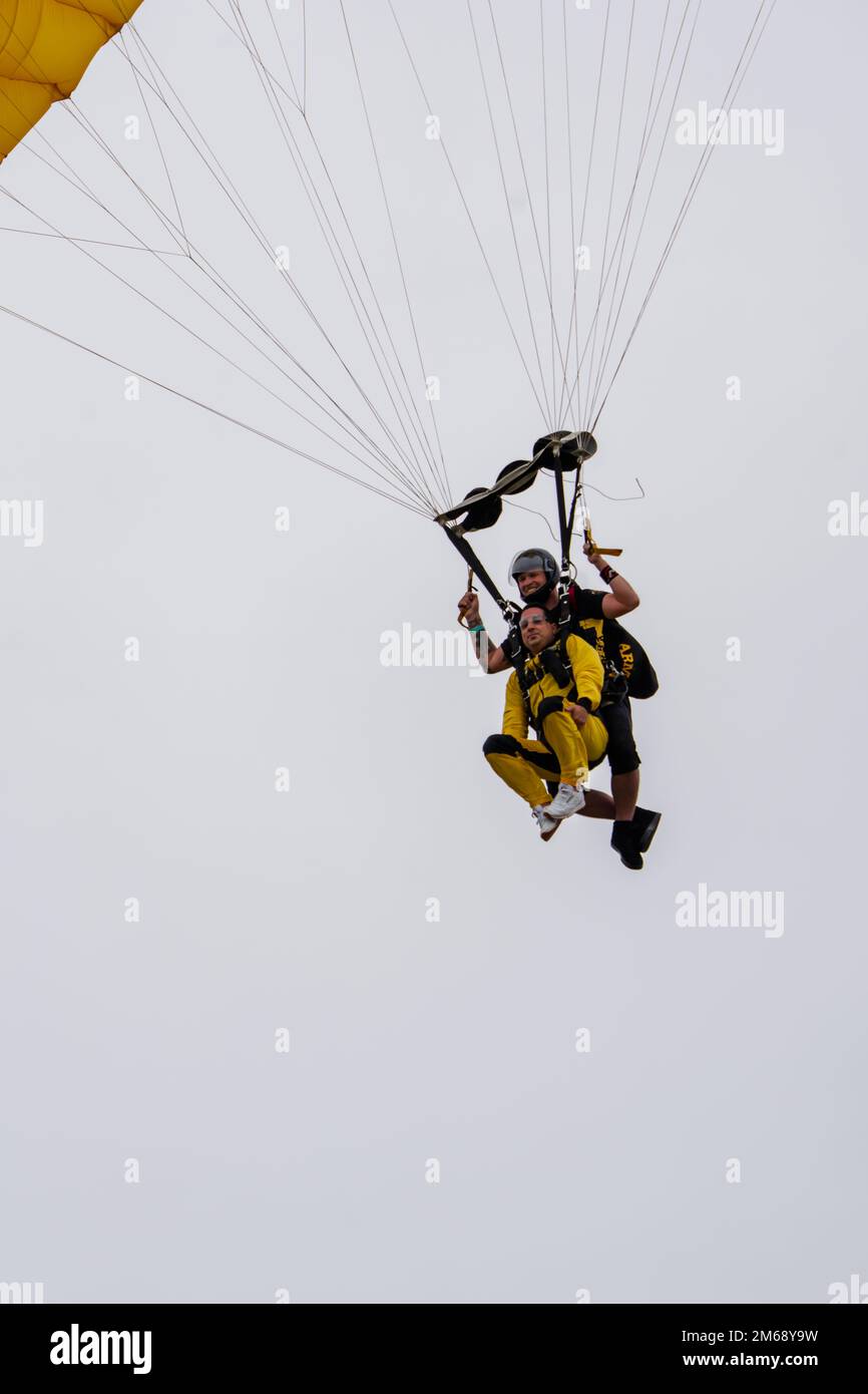 Sgt. Jonathan Pemberton of the U.S. Army Parachute Team makes a tandem ...