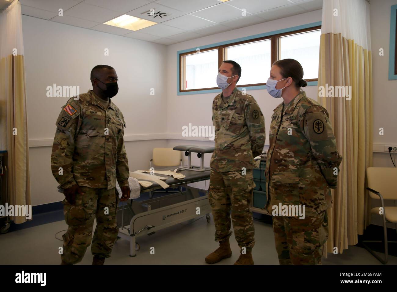 Lt. Gen. R. Scott Dingle, left, surgeon general of the Army and Medical ...
