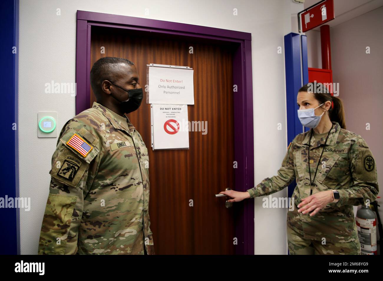 Lt. Gen. R. Scott Dingle, left, surgeon general of the Army and Medical ...