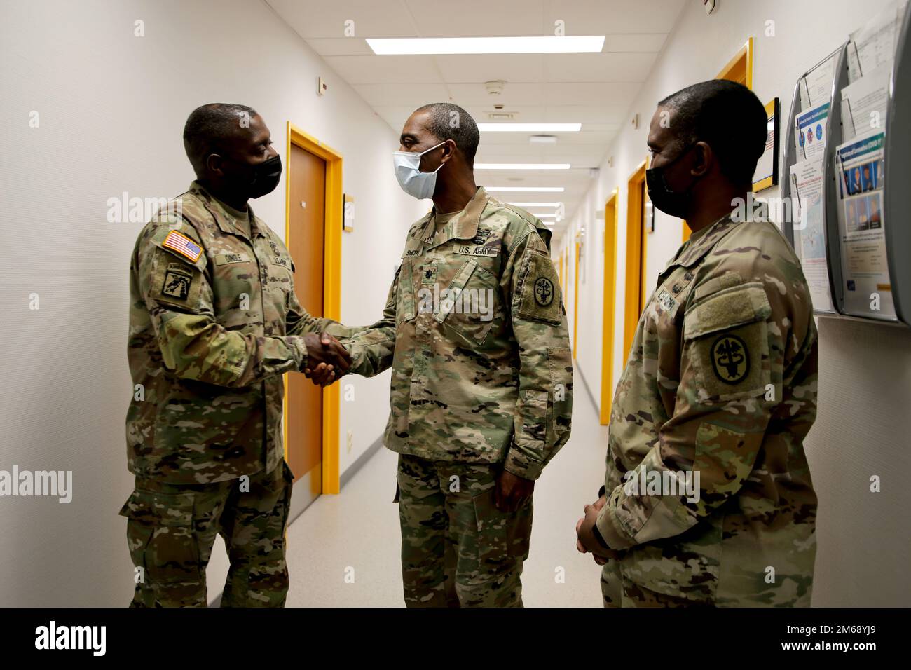 Lt. Gen. R. Scott Dingle, left, surgeon general of the Army and Medical ...