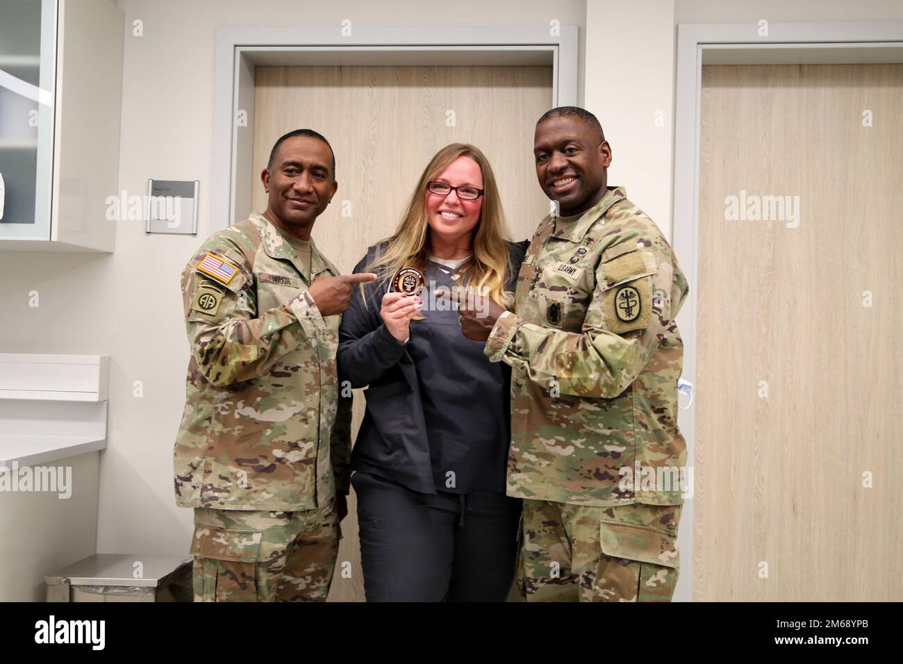 U.S. Army Medical Command Command Sgt. Maj. Diamond D. Hough, left, and ...
