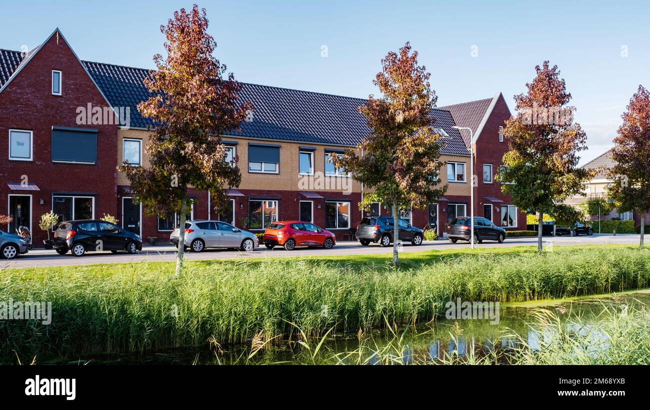 Dutch Suburban area with modern family houses, newly build modern ...