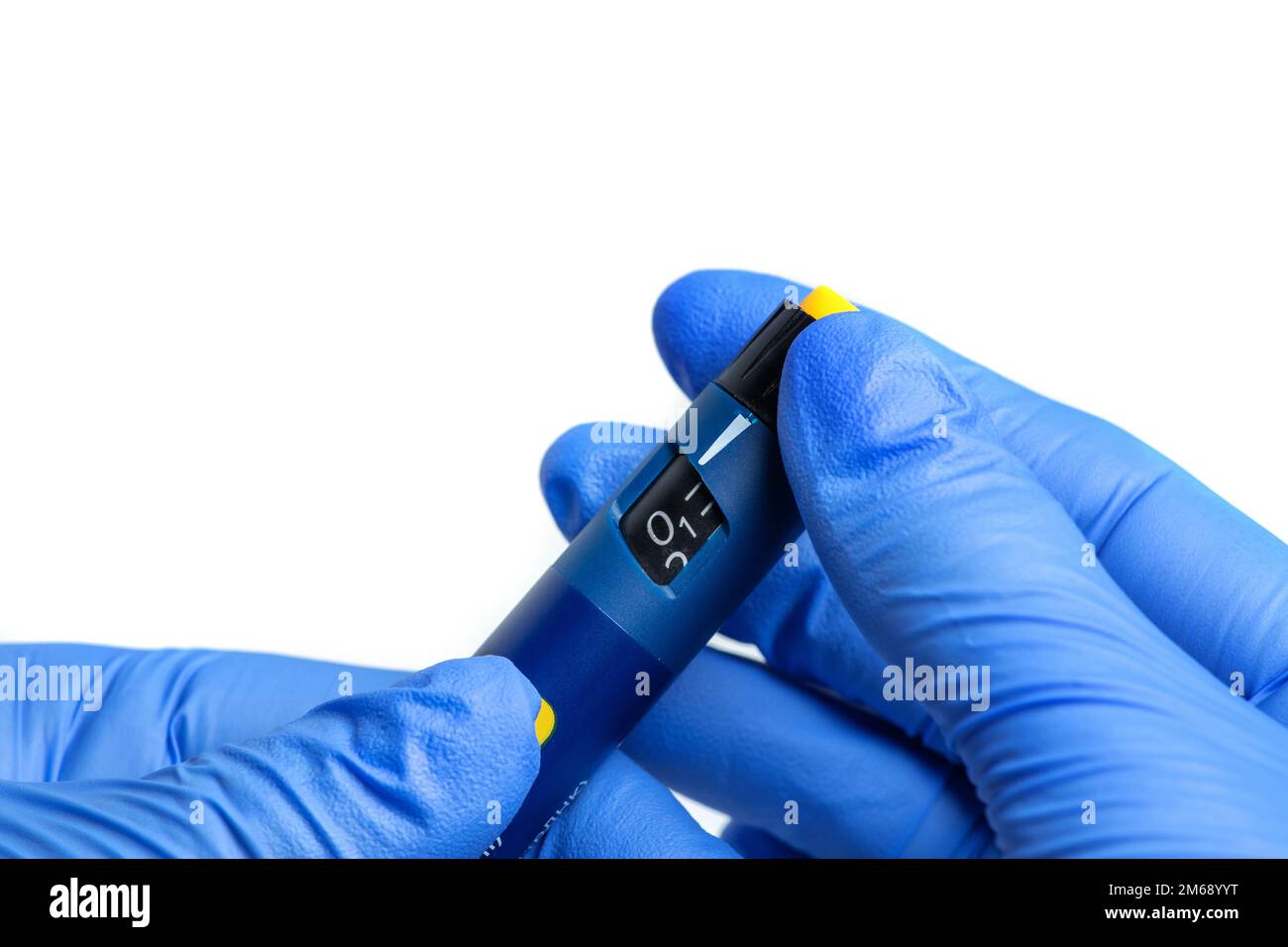 Scale on the bottom of insulin pen in hand of the doctor, self ...