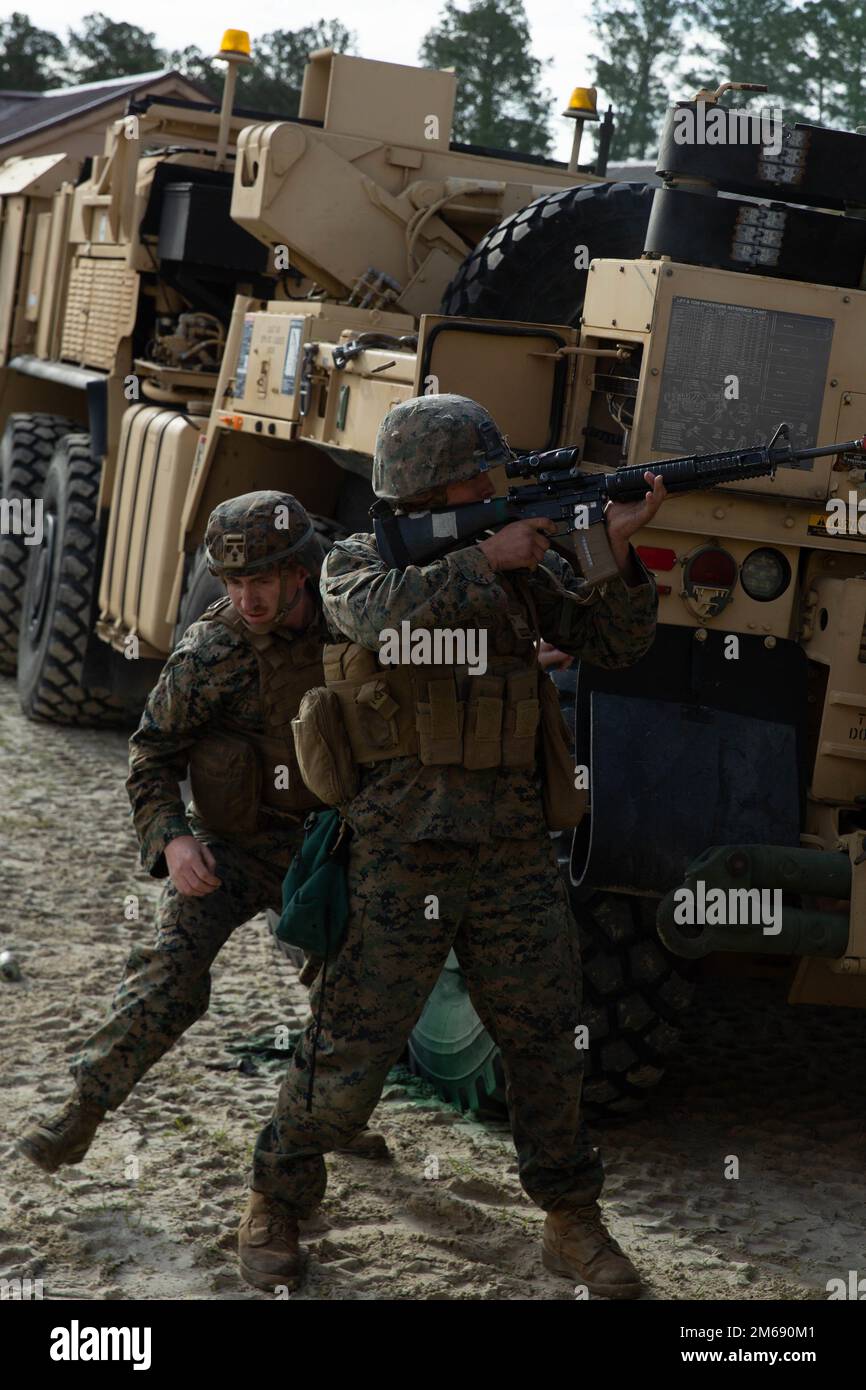U.S. Marine Corps Cpl. Matthew Wilds, left, a motor vehicle operator ...