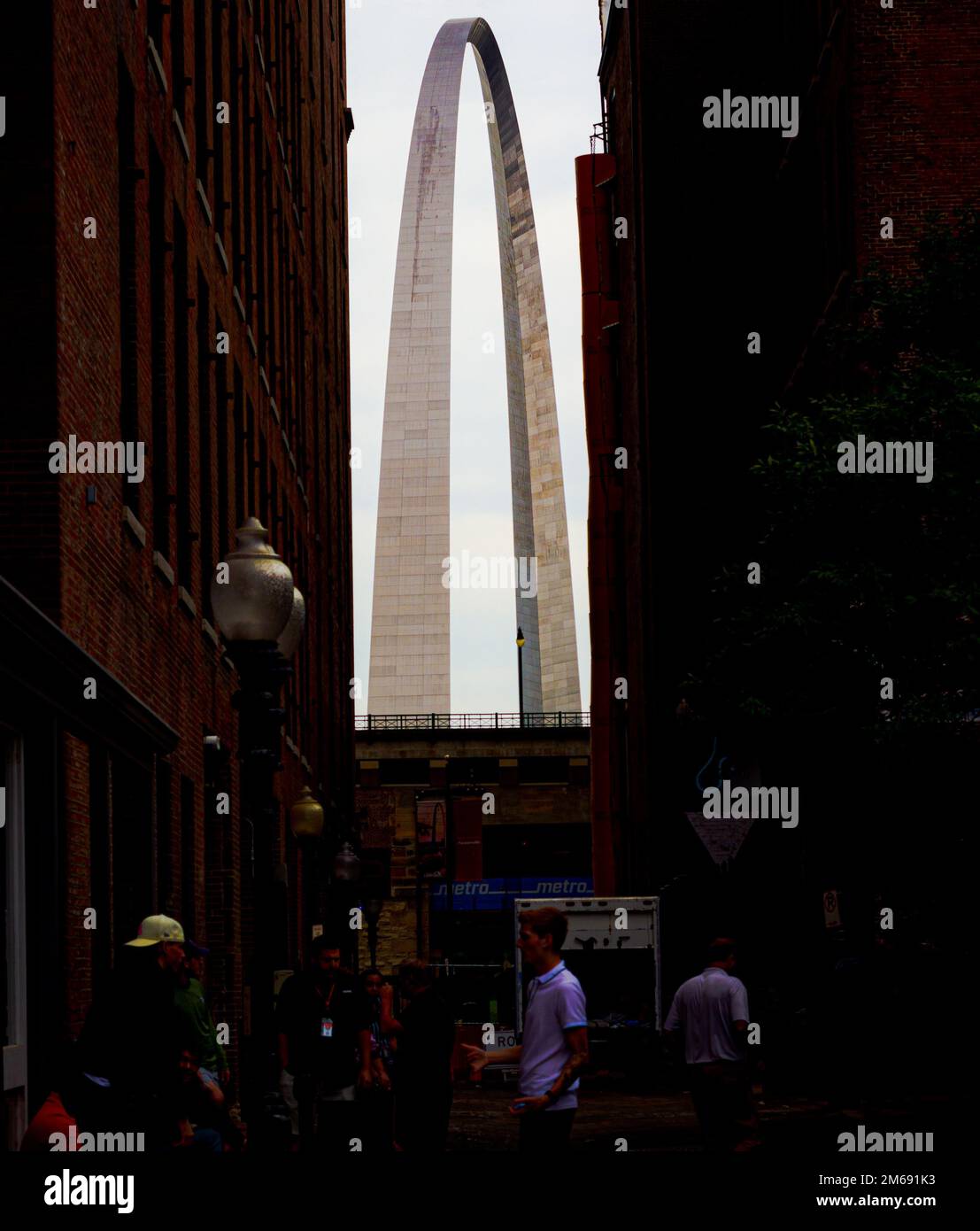 A vertical shot of the gateway arch from a street in downtown St. Louis ...