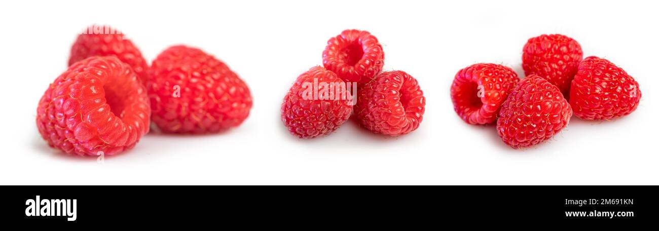 Bunch of raspberry fruits isolated on white background Stock Photo - Alamy