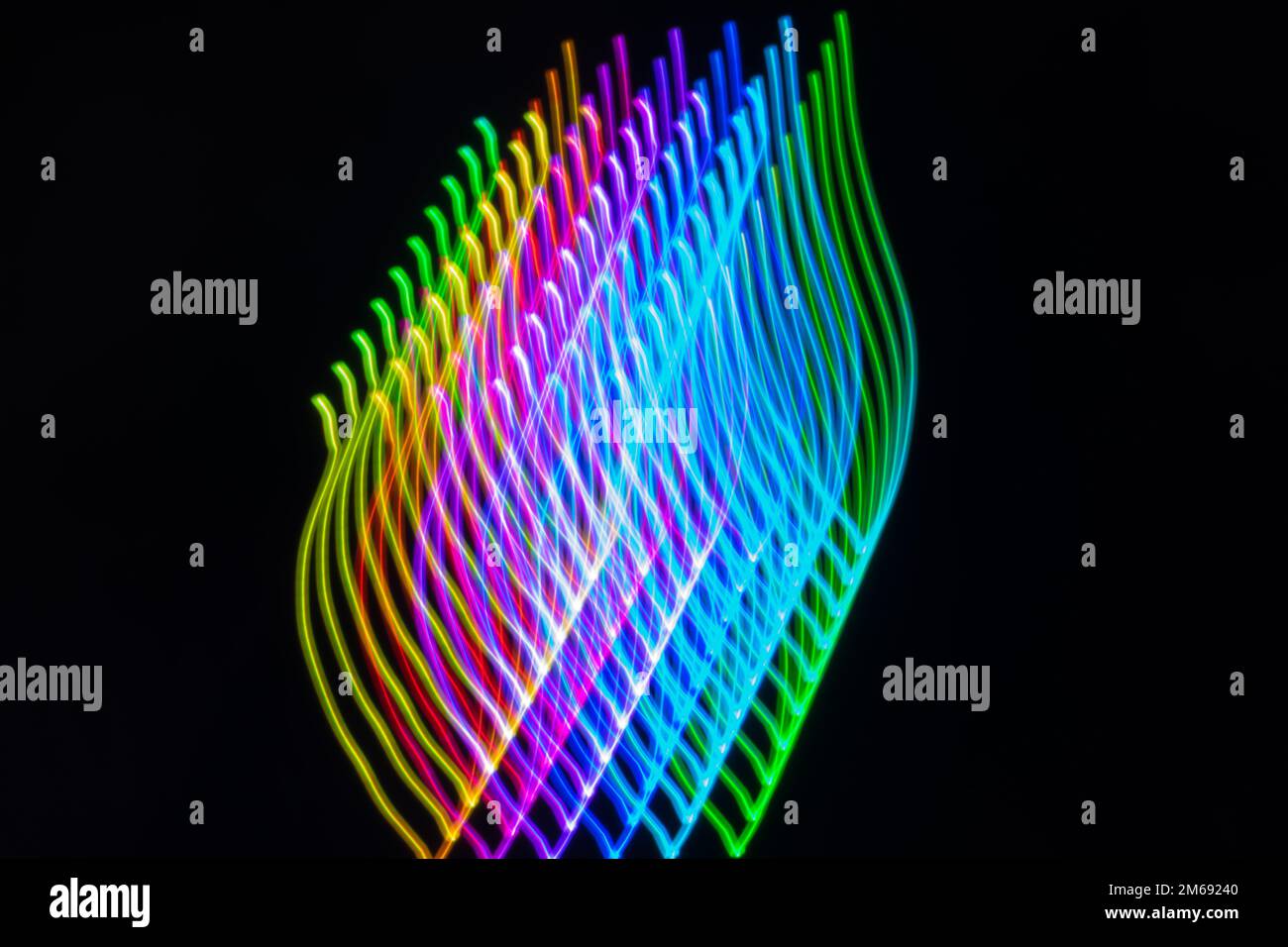 Beautiful light painting designs on dark black background. Long ...