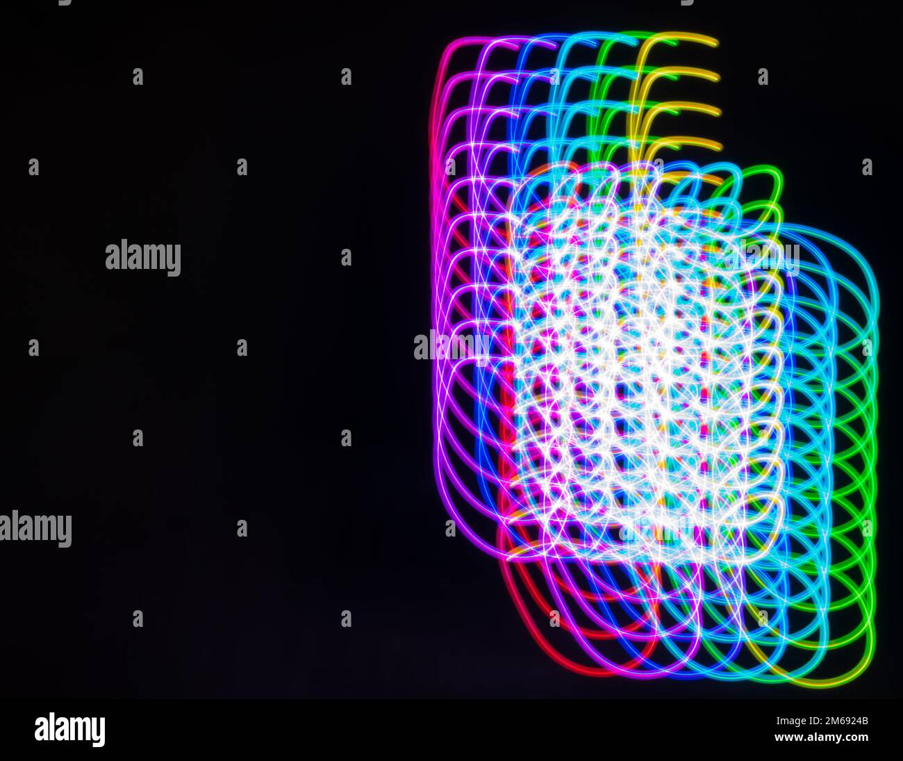 Beautiful light painting designs on dark black background. Long ...