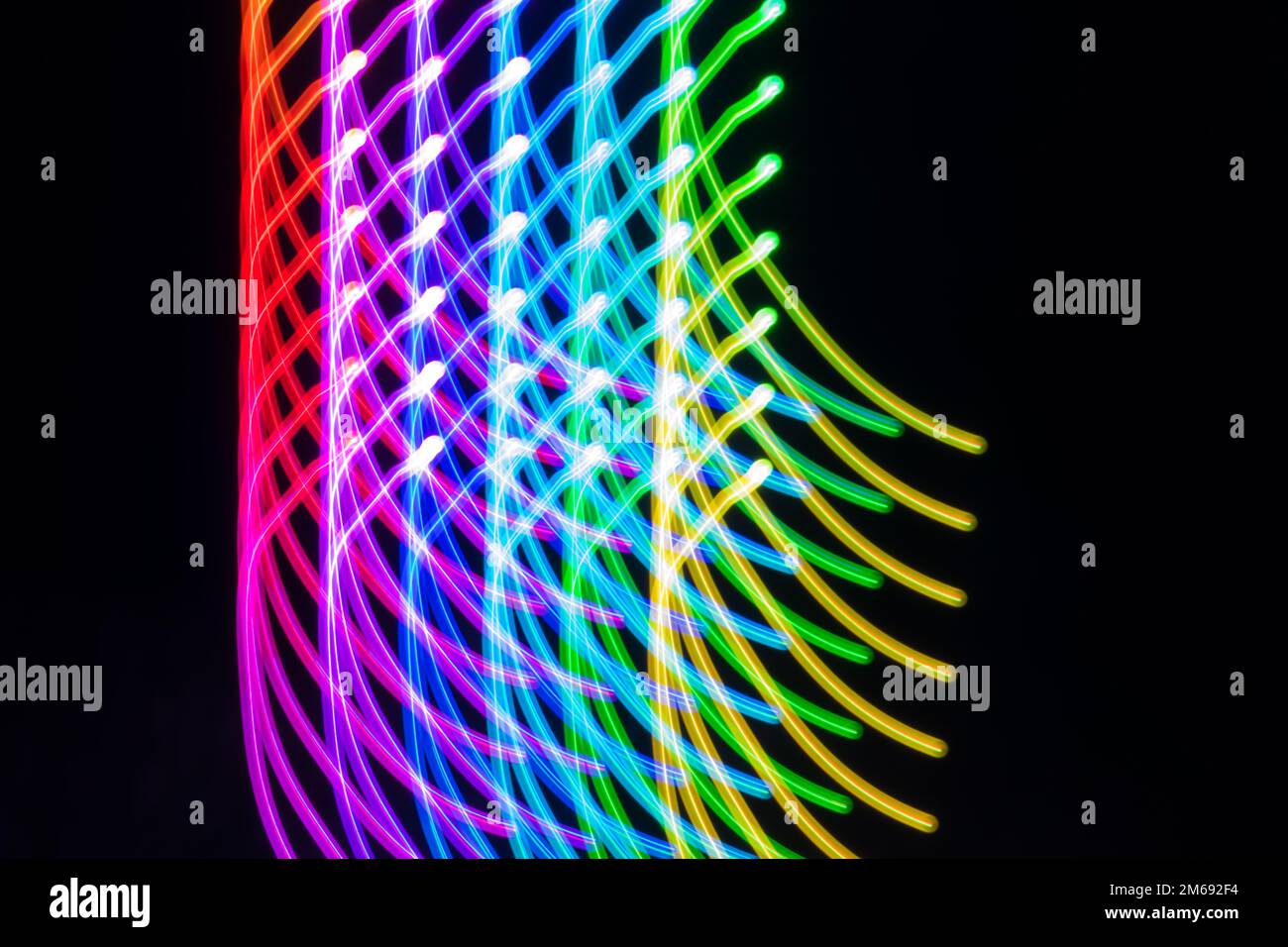 Beautiful light painting designs on dark black background. Long ...
