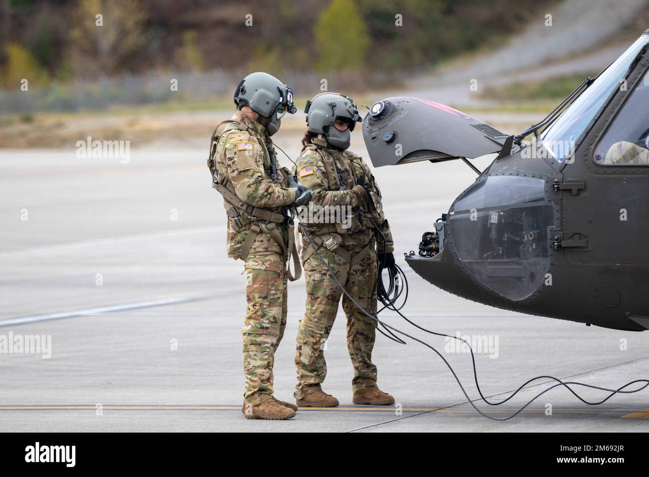 Spc. Casandra Nardo and Spc. Riley Williams, crew chiefs assigned to ...