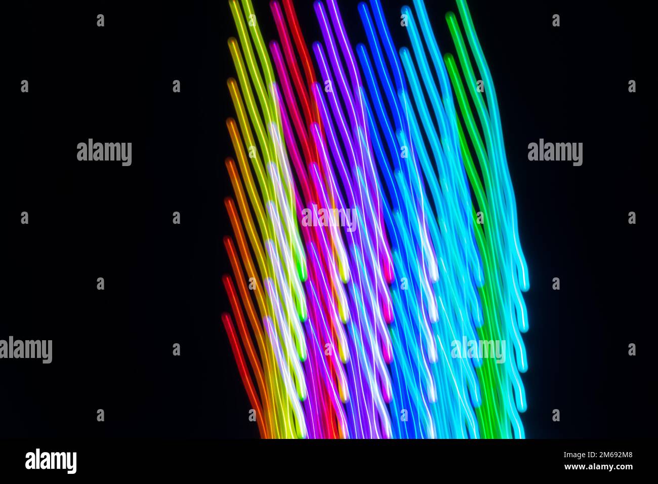 Beautiful light painting designs on dark black background. Long ...