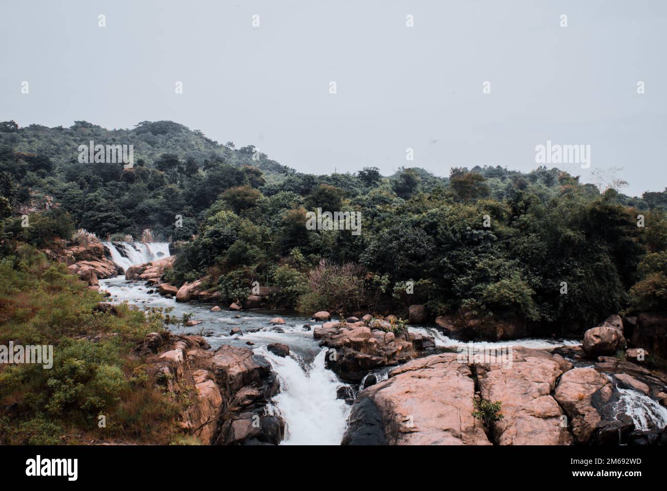 A beautiful view of a river flowing from the rocks Stock Photo - Alamy